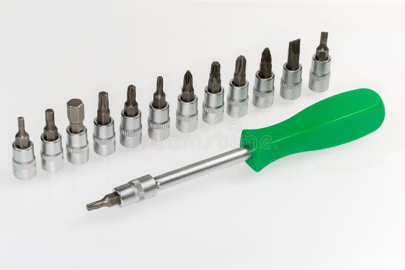 Screwdriver with Interchangeable Bits and Set of Different Bits Stock ...