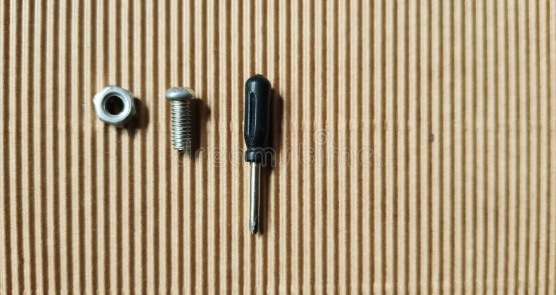 Screwdriver, Nut and Screw. Tools To Fix Things Stock Photo - Image of ...