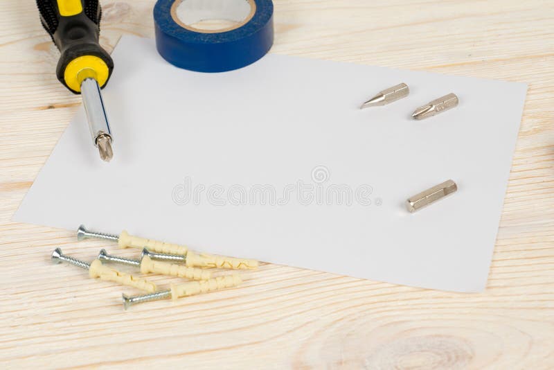 Screwdriver on paper sheet stock image. Image of horizontal - 72206861
