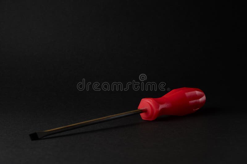 Screwdriver with Red Handle on Black Background Stock Image - Image of ...
