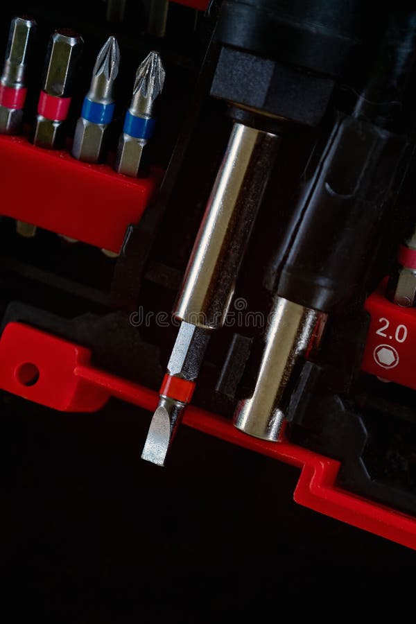 Screwdriver in Red Plastic Box with Various Replaceable Tips Stock ...