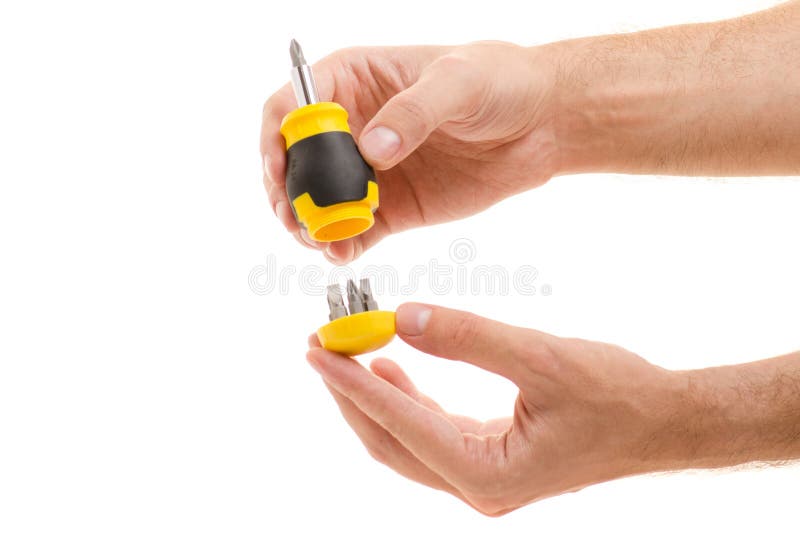 Screwdriver in hand stock image. Image of metal, build - 106028501