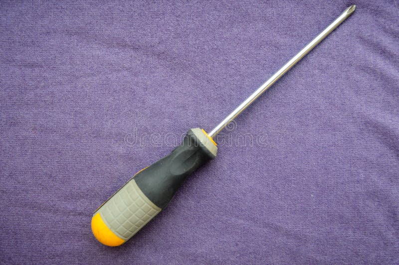 Screwdriver with a Rubberized Yellow-gray Handle Stock Image - Image of ...