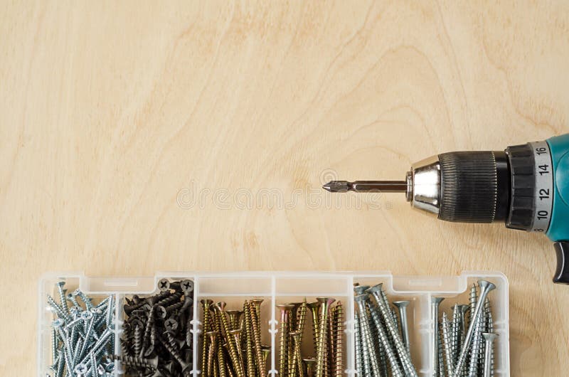 Screwdriver and Screws of Different Sizes in Box Stock Photo - Image of ...