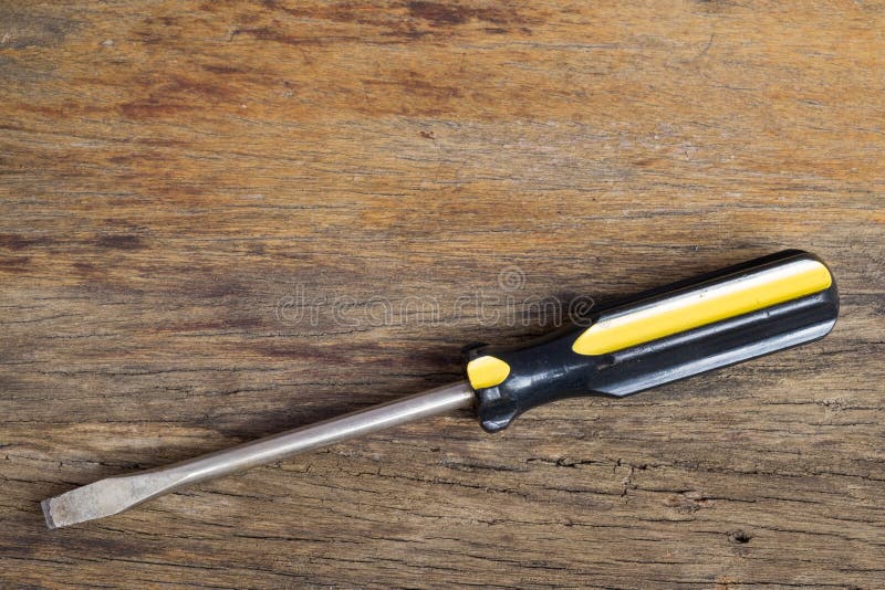 Screwdriver on table stock photo. Image of screwdriver - 63166334