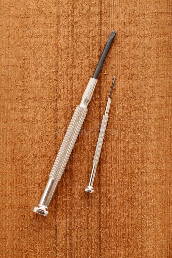Screwdrivers on Wood stock image. Image of miniature - 25937347