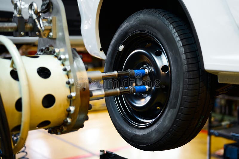 Screwing Car Wheel with Automatic Multi-axial Spanner Wrench Stock ...