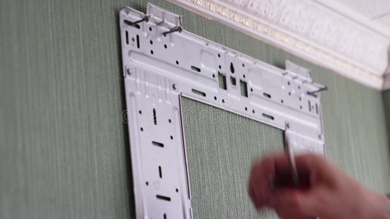 Screwing the Mounting Bar To the Wall Stock Video - Video of ...