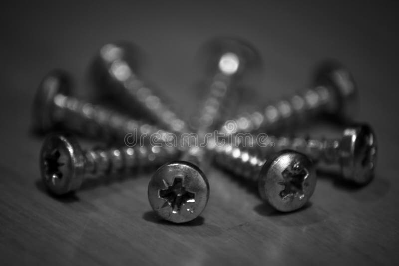 Screws Arranged in a Circle Stock Photo - Image of black, tools: 158967498