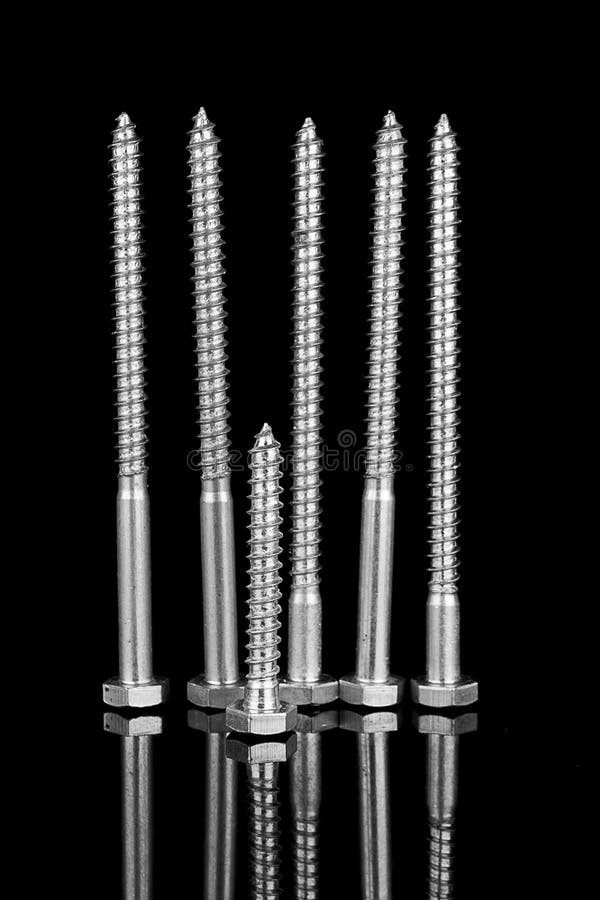 Screws on Black background stock image. Image of iron - 32584953