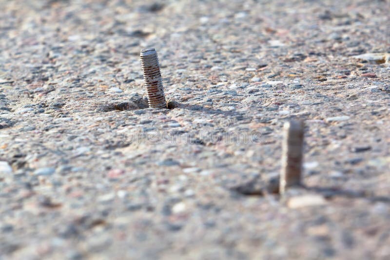 Screws in Concrete stock photo. Image of cement, foundation - 53822544