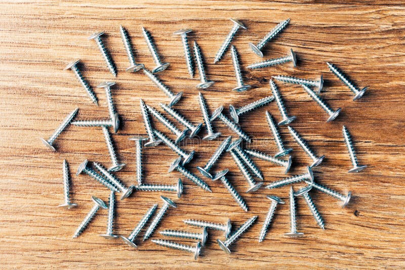 Screws Fasteners Hardware on Wooden Background Stock Photo - Image of ...