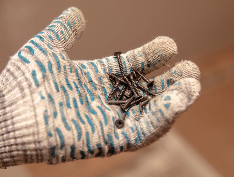 Screws in the Hand of a Worker Stock Image - Image of closeup ...