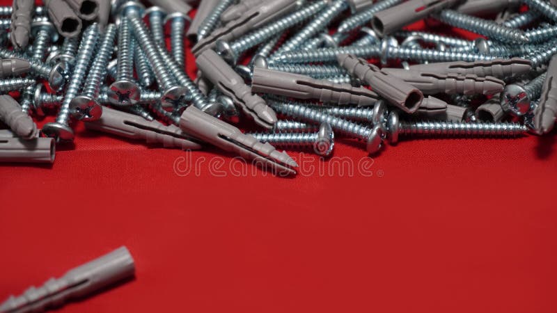 Screws and Plastic Dowels Top Side Stock Image - Image of grey, bunch ...