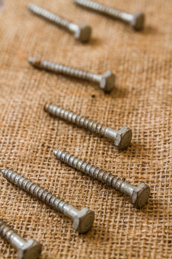 Screws on Sack Fabric stock image. Image of grey, black - 48477813