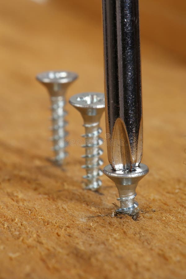 Screws and screwdriver stock image. Image of hardware - 39591531