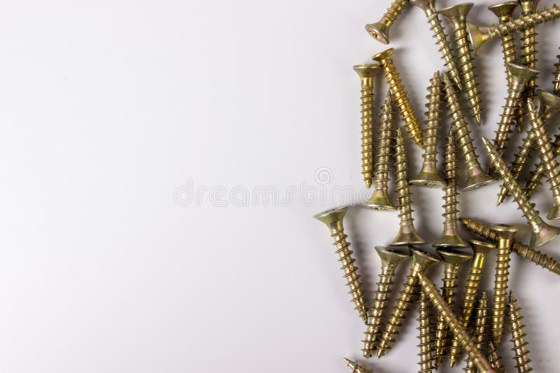 The Screws are Stacked on a White Background with Space for Text or ...