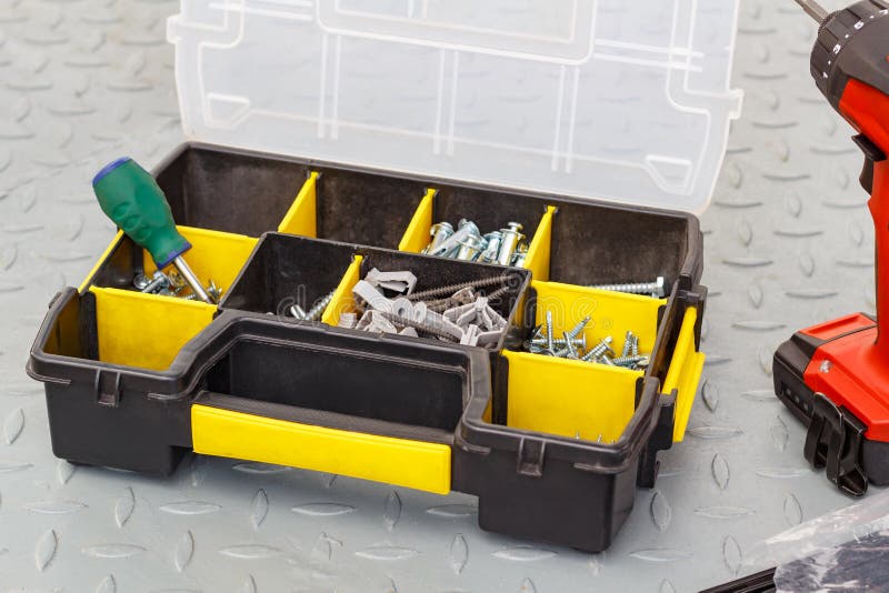 Screws in a Storage Box with Screwdriver Stock Photo - Image of ...