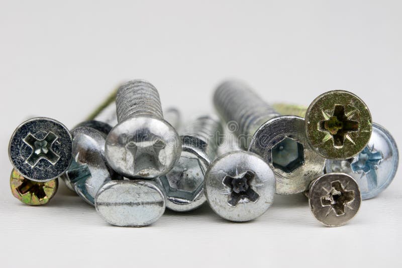 Screws on a White Table. Accessories for Connections Stock Image ...