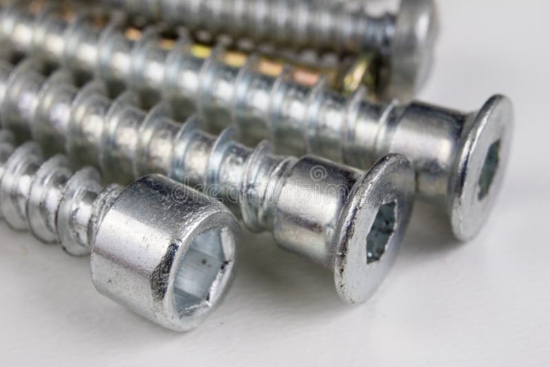 Screws on a White Table. Accessories for Connections Stock Image ...