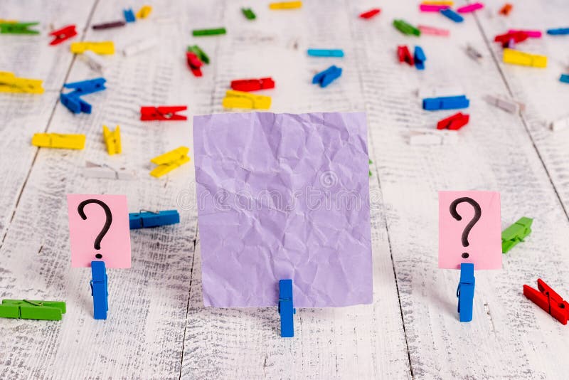 Scribbled and Crumbling Papers with Paper Clips Placed on the Wooden ...