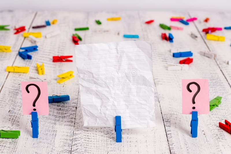 Scribbled and Crumbling Papers with Paper Clips Placed on the Wooden ...