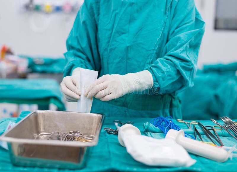 Scrub Nurse Prepare Medical Instruments For Surgery Stock Image - Image ...