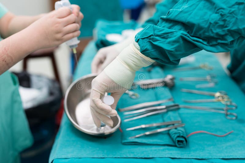 Scrub Nurse Preparing Medical Instruments for Operation Stock Image ...