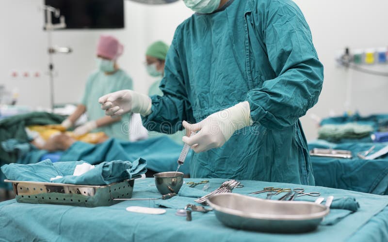 Scrub Nurse Preparing Medical Instruments for Operation Stock Image ...