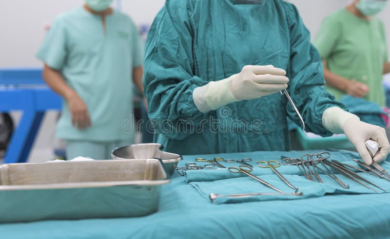 Scrub Nurse Prepare Medical Equipments For Surgery Stock Image - Image ...