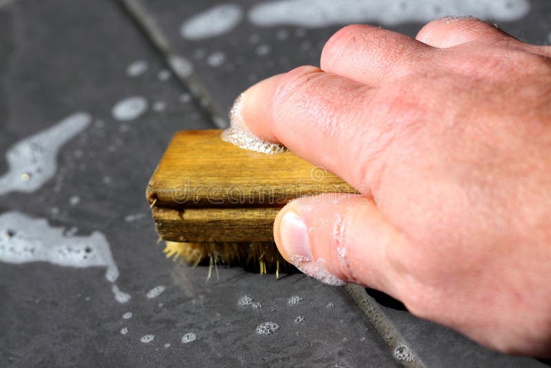 Scrubbing floor tiles stock photo. Image of hand, cleaning - 20907334