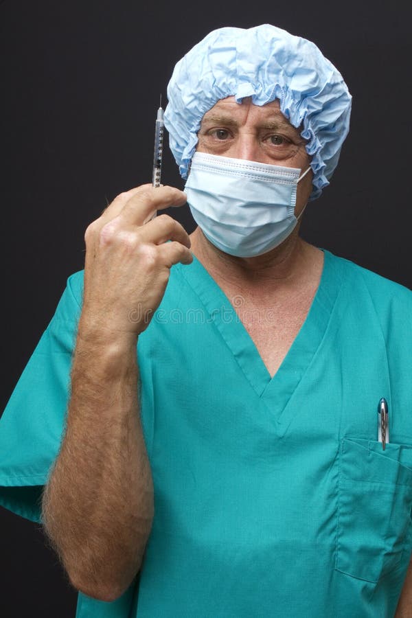 Scrubs and a Syringe stock photo. Image of vertical, anesthetic - 27106974