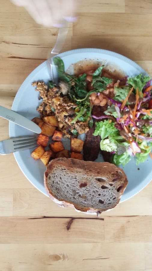 Scrumptious Breakfast of Poached Eggs and Home Fries Stock Photo ...