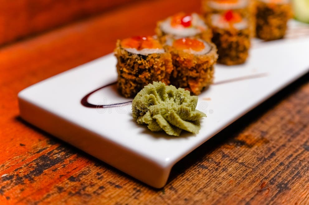 The Scrumptious Sushi Sampler on the Glazed Stand Was Visually ...