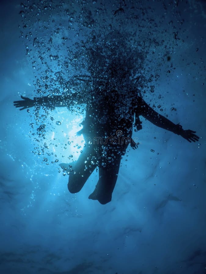 Scuba Diver Silhouettes Blue Water Stock Image - Image of blue, explore ...