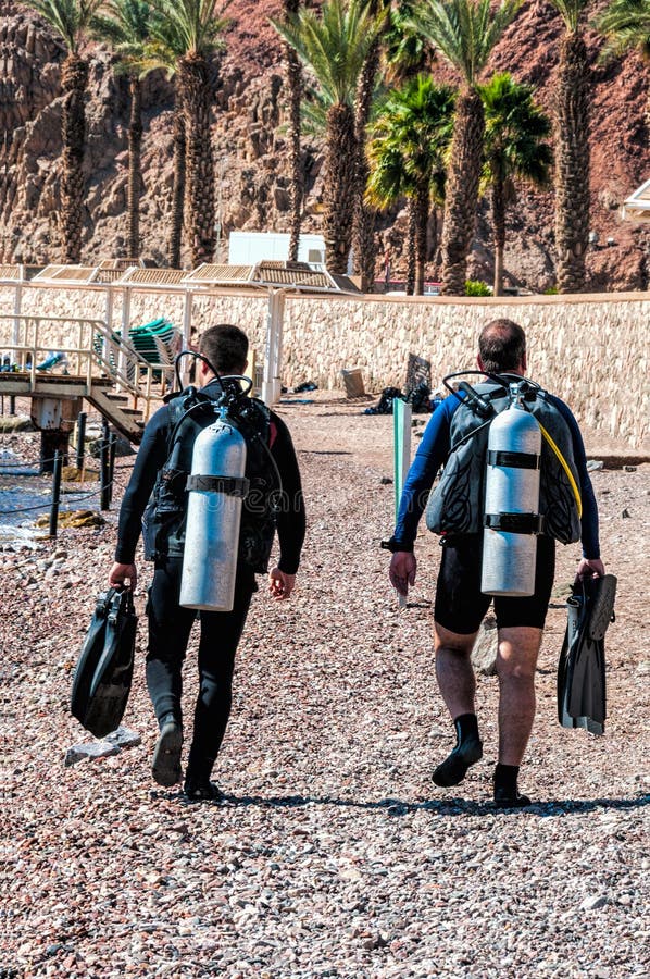 Scuba divers go to the sea editorial stock photo. Image of sport ...