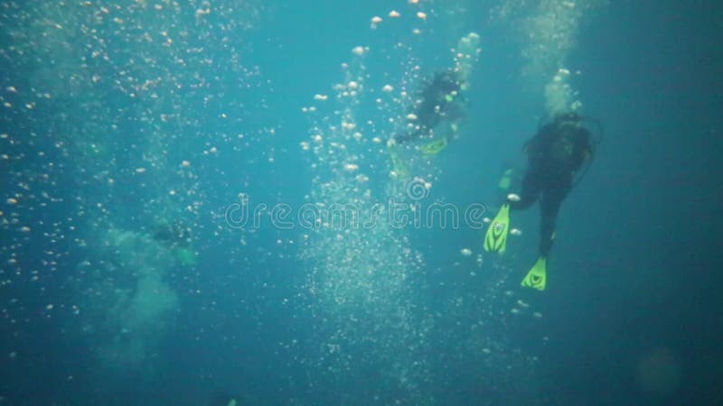 Scuba Divers Submerged in Pool with Many Bubbles Stock Footage - Video ...