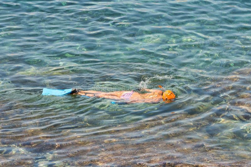 Image of Scuba, Female Legs on Mat on Summer Stock Photo - Image of ...