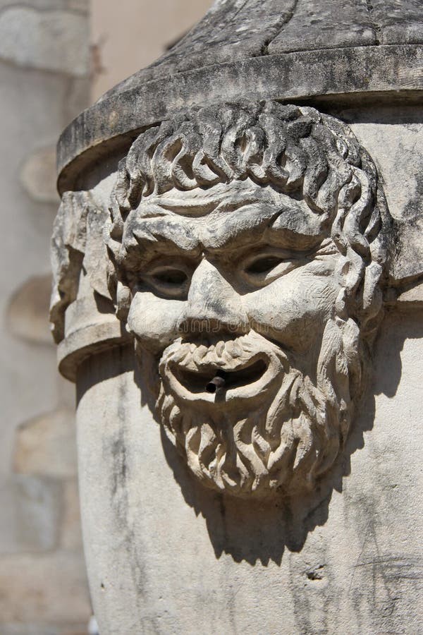 Sculpted Fountain in Clisson - France Stock Image - Image of face ...