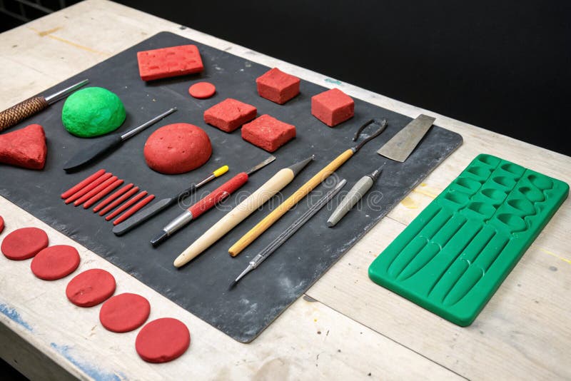 Sculpting Tools and Clay on Concrete Table Stock Illustration ...