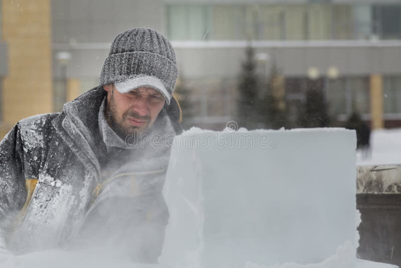 The Wizard Cuts Figures from the Ice Chainsaw Stock Image - Image of ...