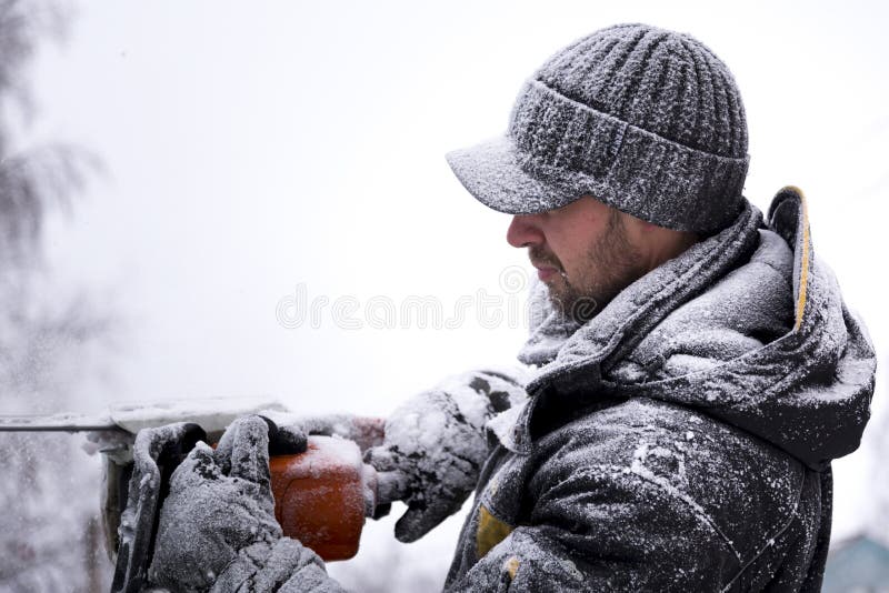 The Wizard Cuts Figures from the Ice Chainsaw Stock Image - Image of ...
