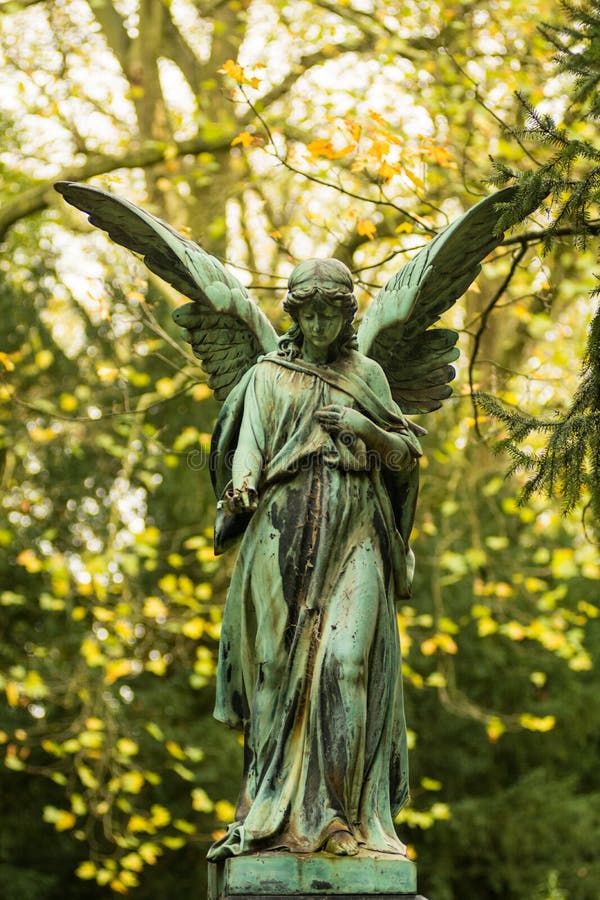 Angel Sculpture on Graveyard Stock Image - Image of religious, polish ...