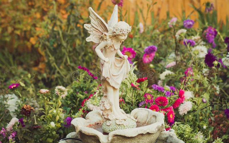 Sculpture of Angel in Ornamental Garden Stock Image - Image of pray ...