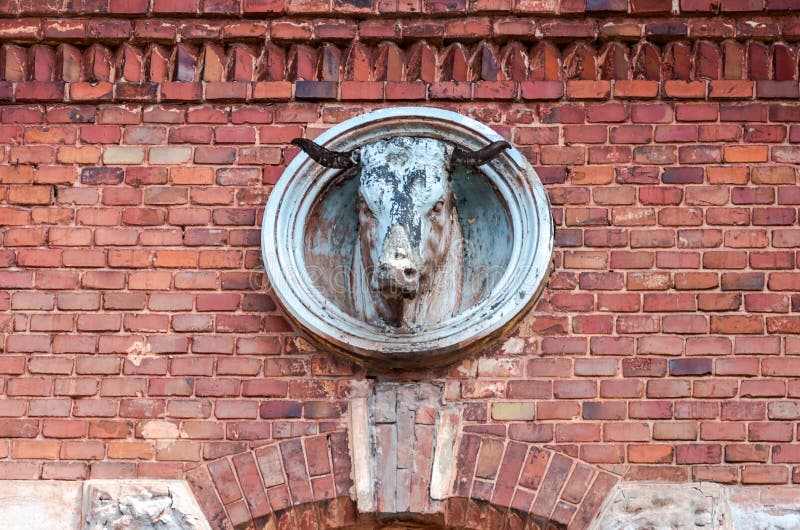 Sculpture of a Bull S Head on a Building of Red Brick Stock Image ...