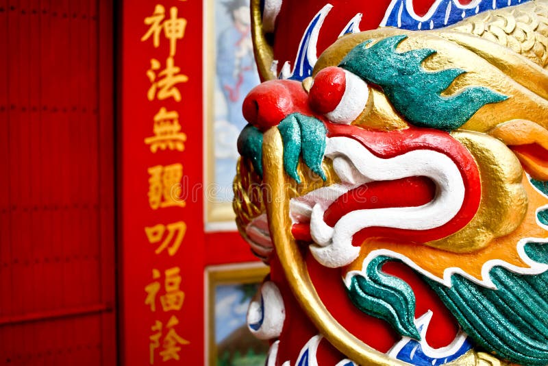 Sculpture of Dragon Wrapped Around the Pole at Chinese Temple Stock ...