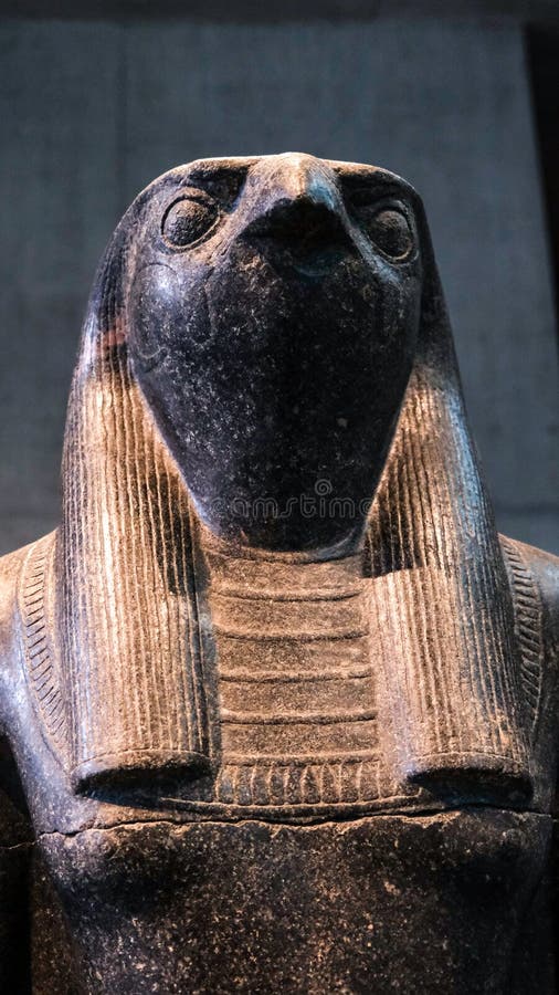 Sculpture of an Egyptian Deity Made of Stone, Displayed in a Museum ...