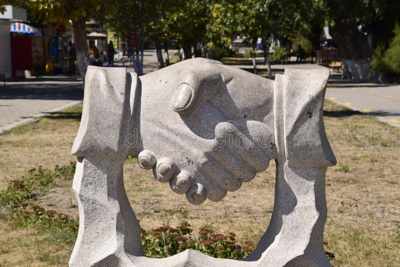 Sculpture Handshake. Symbol of Friendship and Cooperation Editorial ...