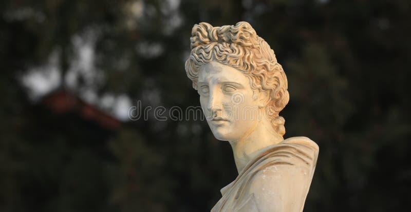 Sculpture of the Head of Apollo Stock Photo - Image of antiquity, stone ...
