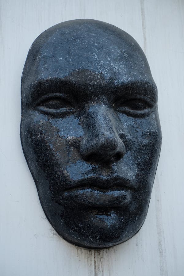 Sculpture of a Human Face Made of Black Material Stock Image - Image of ...